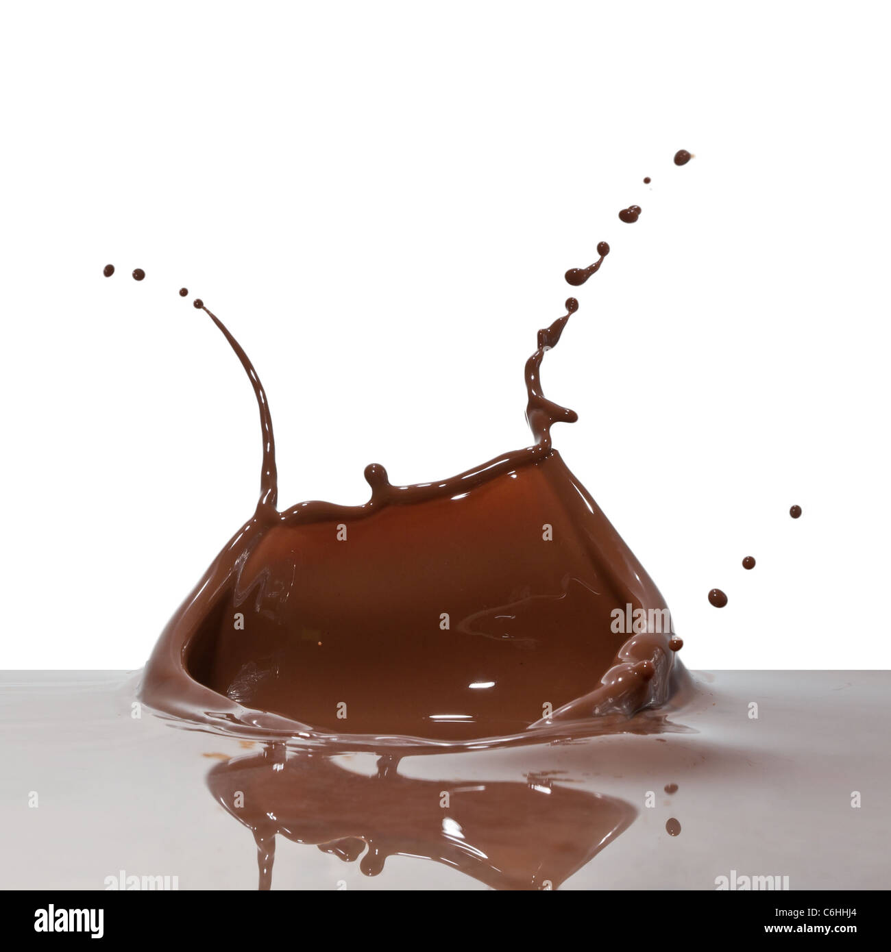 chocolate splash closeup isolated on white background Stock Photo - Alamy