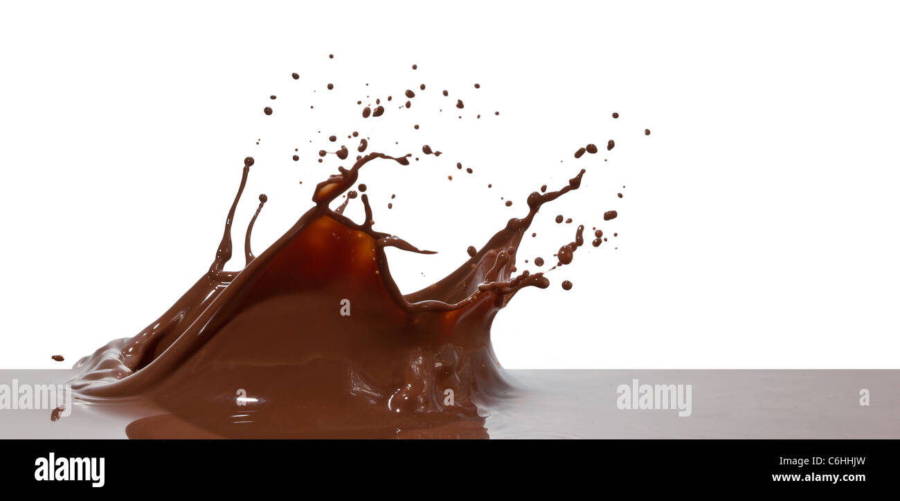 chocolate splash closeup isolated on white background Stock Photo - Alamy