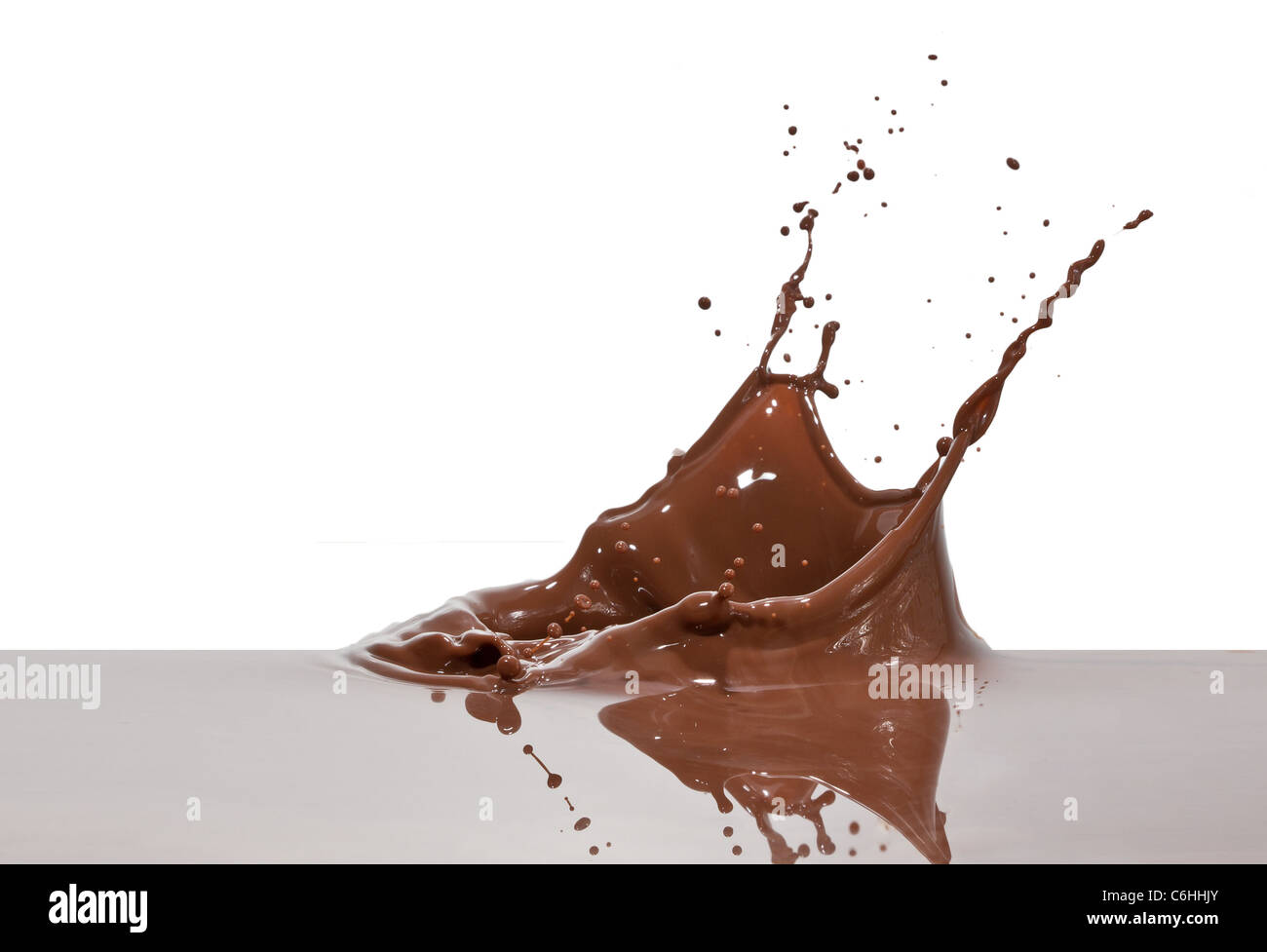 chocolate splash closeup isolated on white background Stock Photo - Alamy