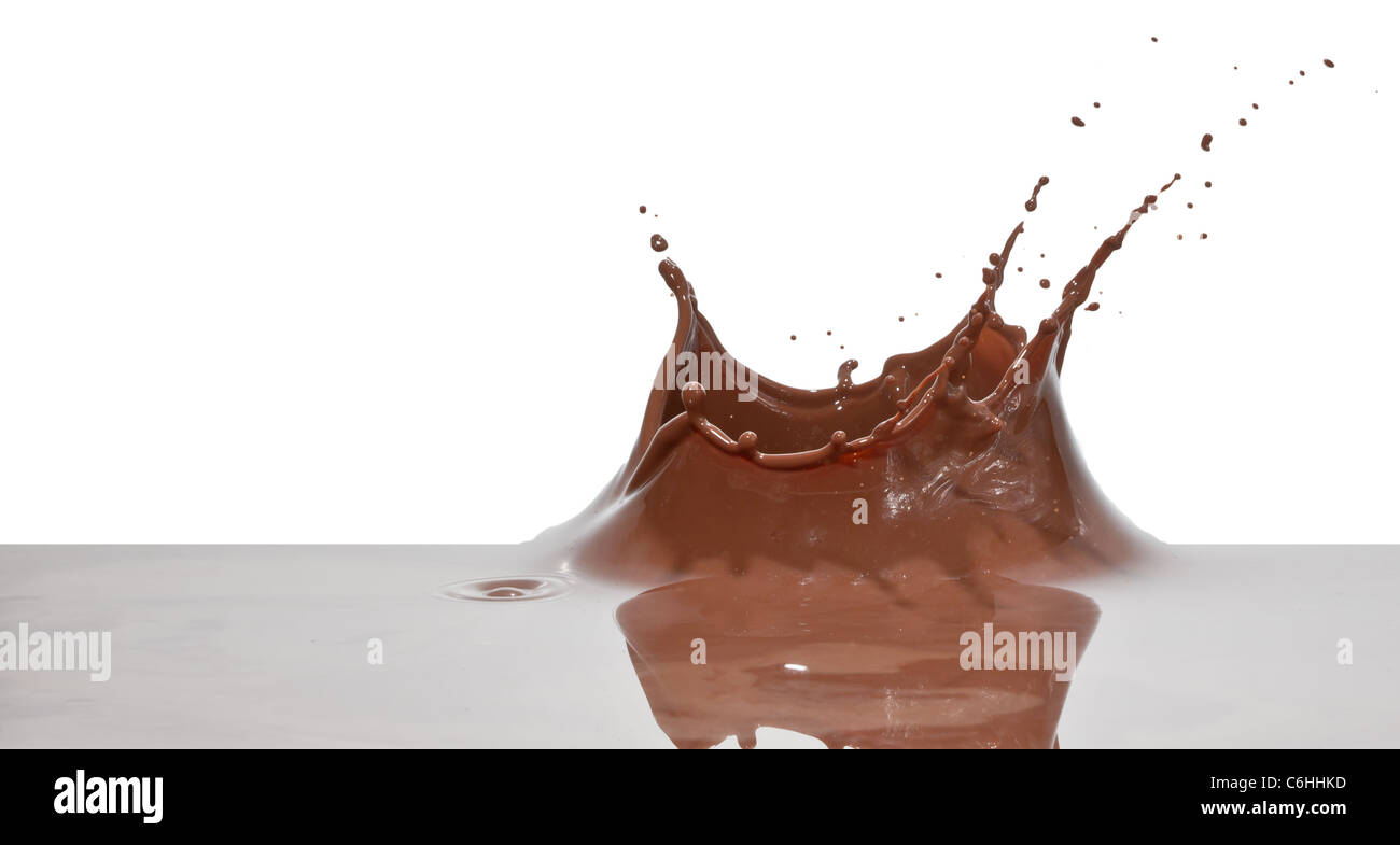 chocolate splash closeup isolated on white background Stock Photo - Alamy