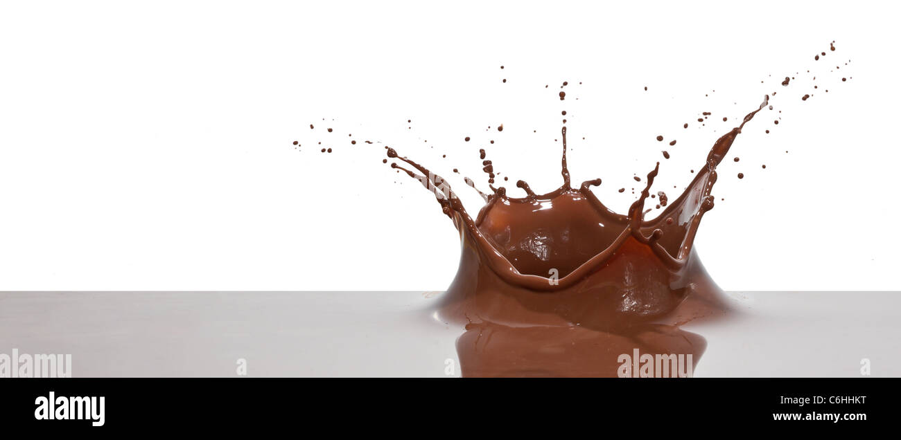 chocolate splash closeup isolated on white background Stock Photo - Alamy