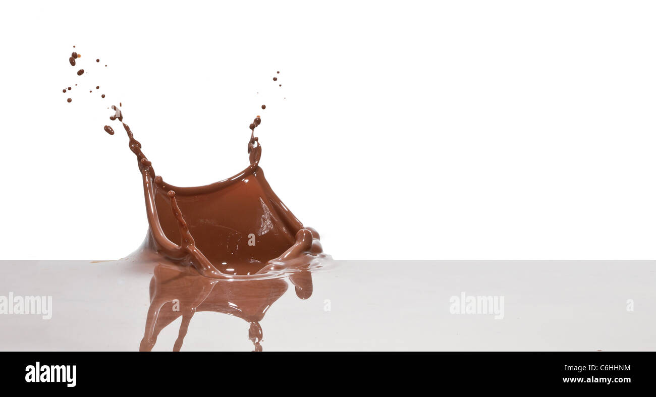 chocolate splash closeup isolated on white background Stock Photo - Alamy