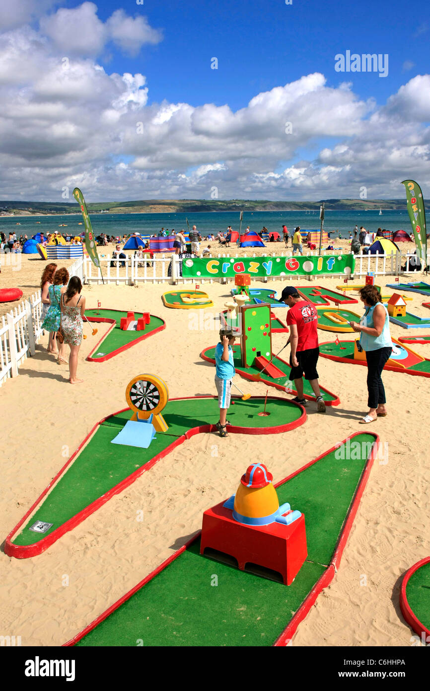 Traditional English seaside fun - Crazy Golf on Weymouth Beach Dorset ...