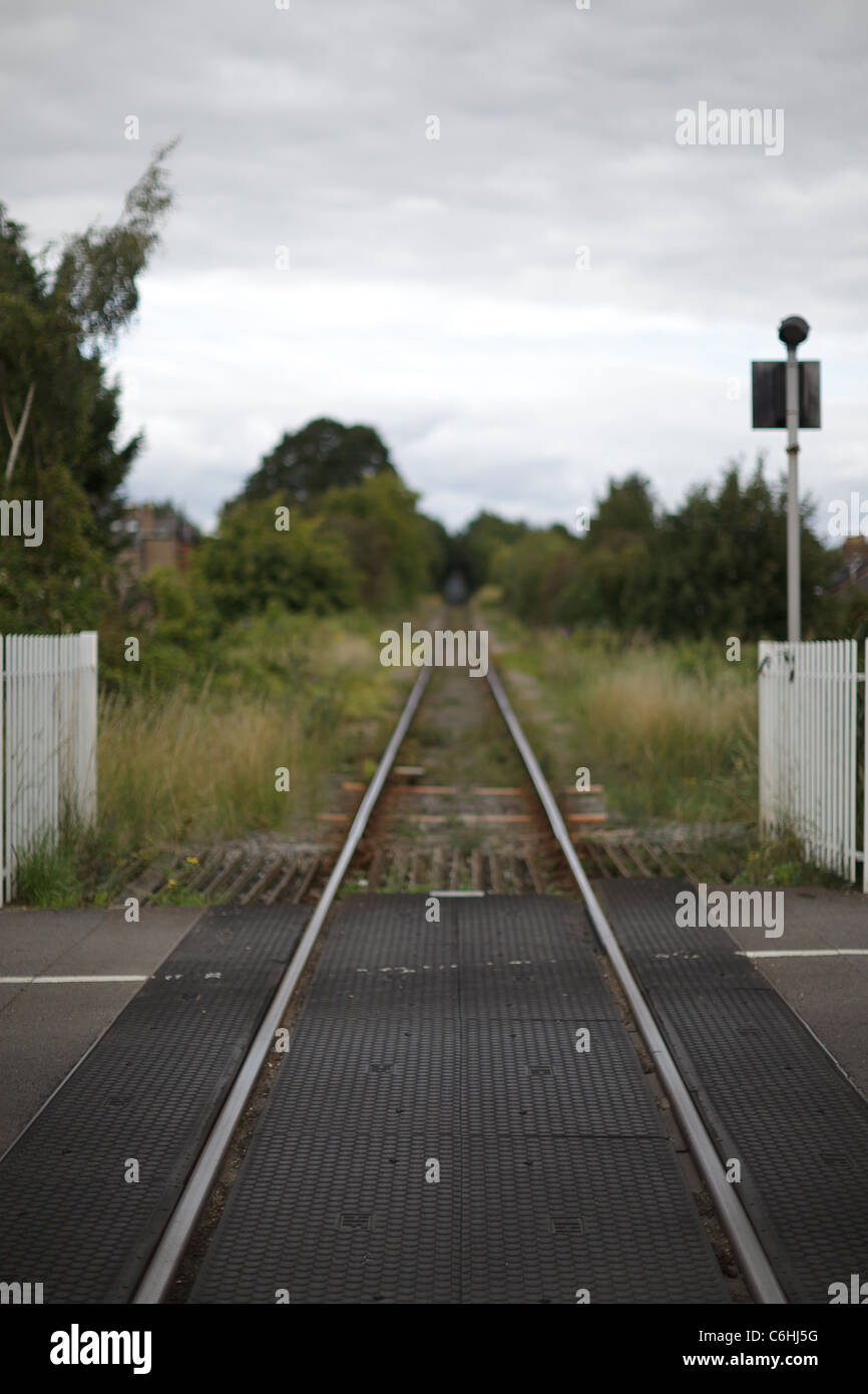 Single track rural level crossing Stock Photo - Alamy