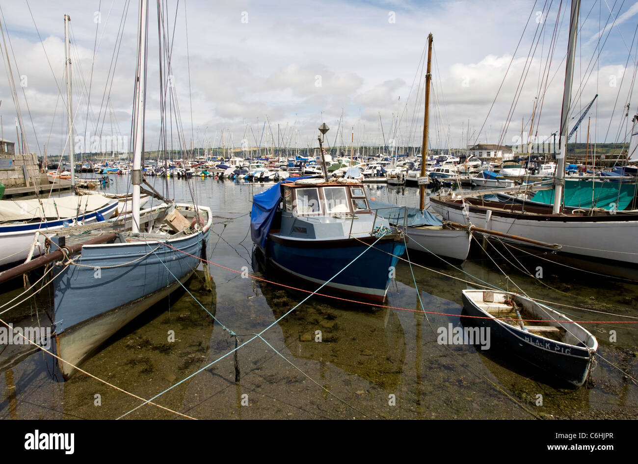 Boats mooring moored alongside mylor yacht harbour hi-res stock ...