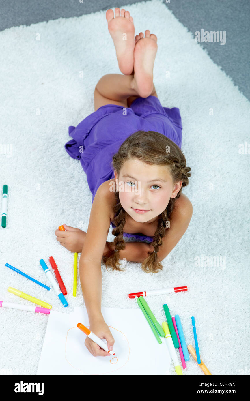 Portrait of lovely girl drawing with colorful pencils Stock Photo - Alamy
