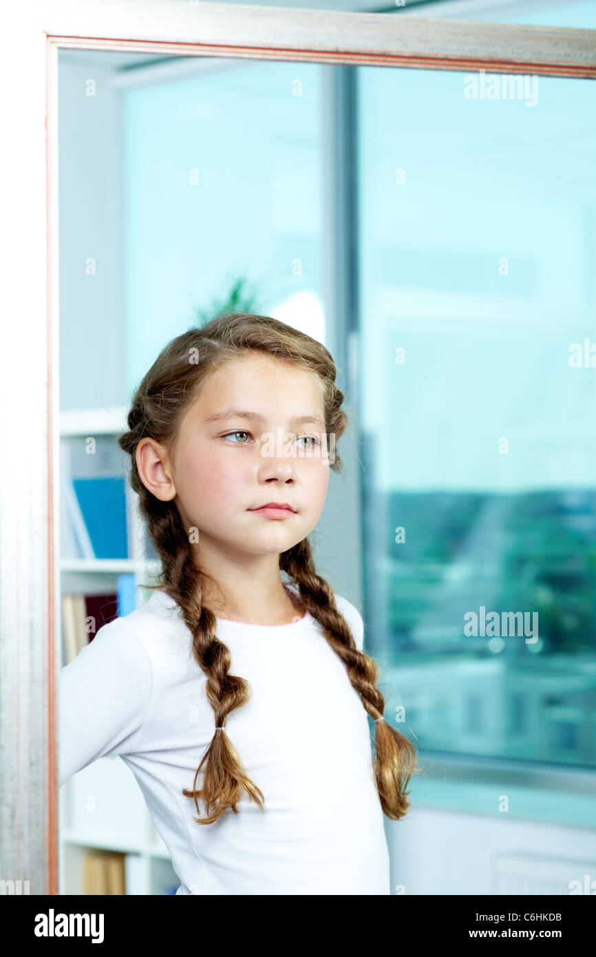 Portrait of cute child posing in front of camera Stock Photo - Alamy