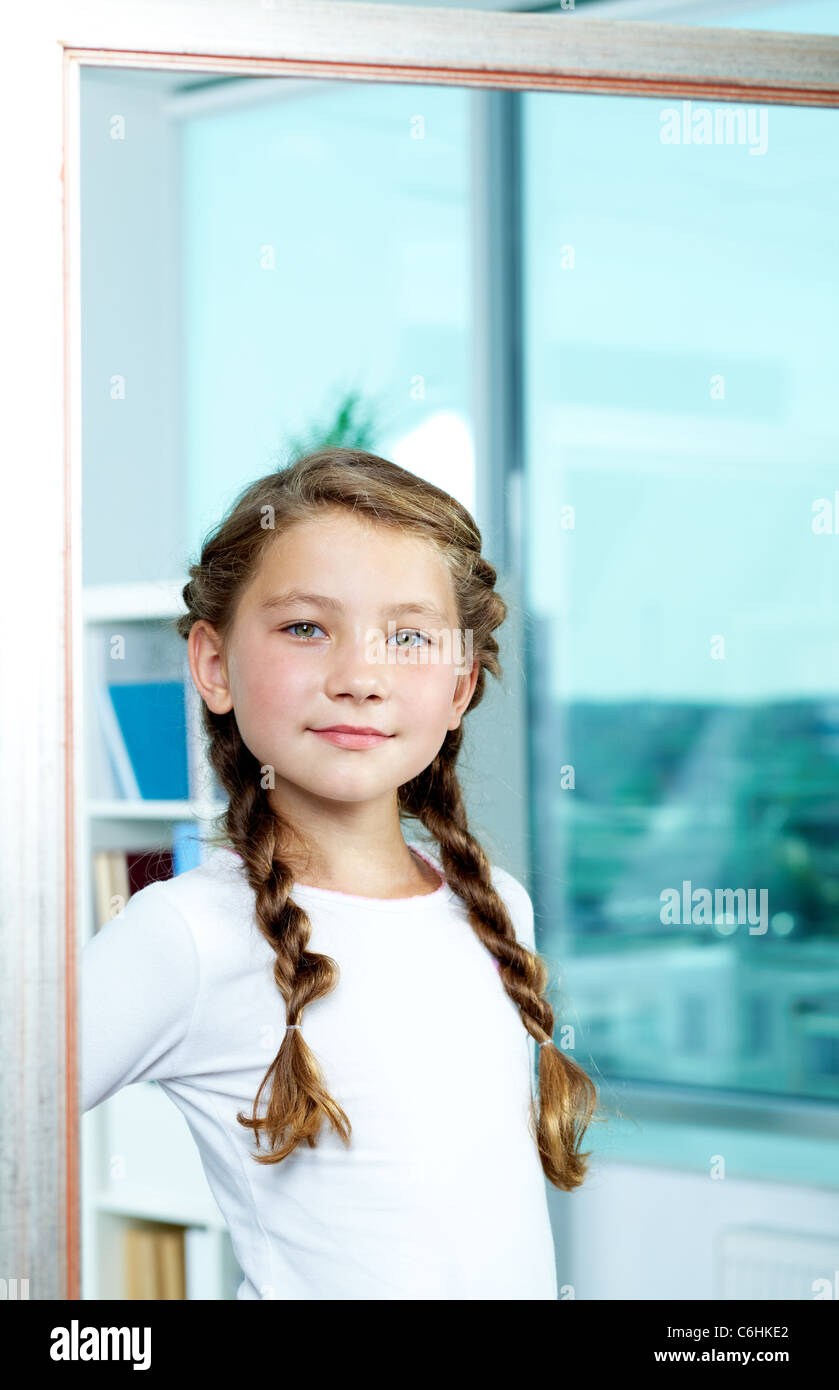 Portrait of cute child posing in front of camera Stock Photo - Alamy