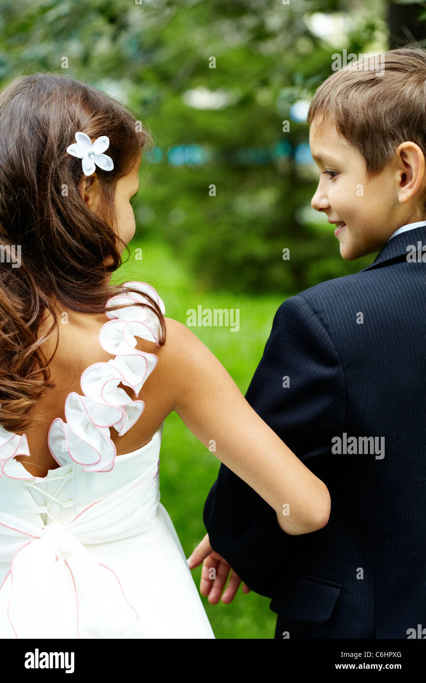 Rear view of children bride and groom on wedding Stock Photo - Alamy