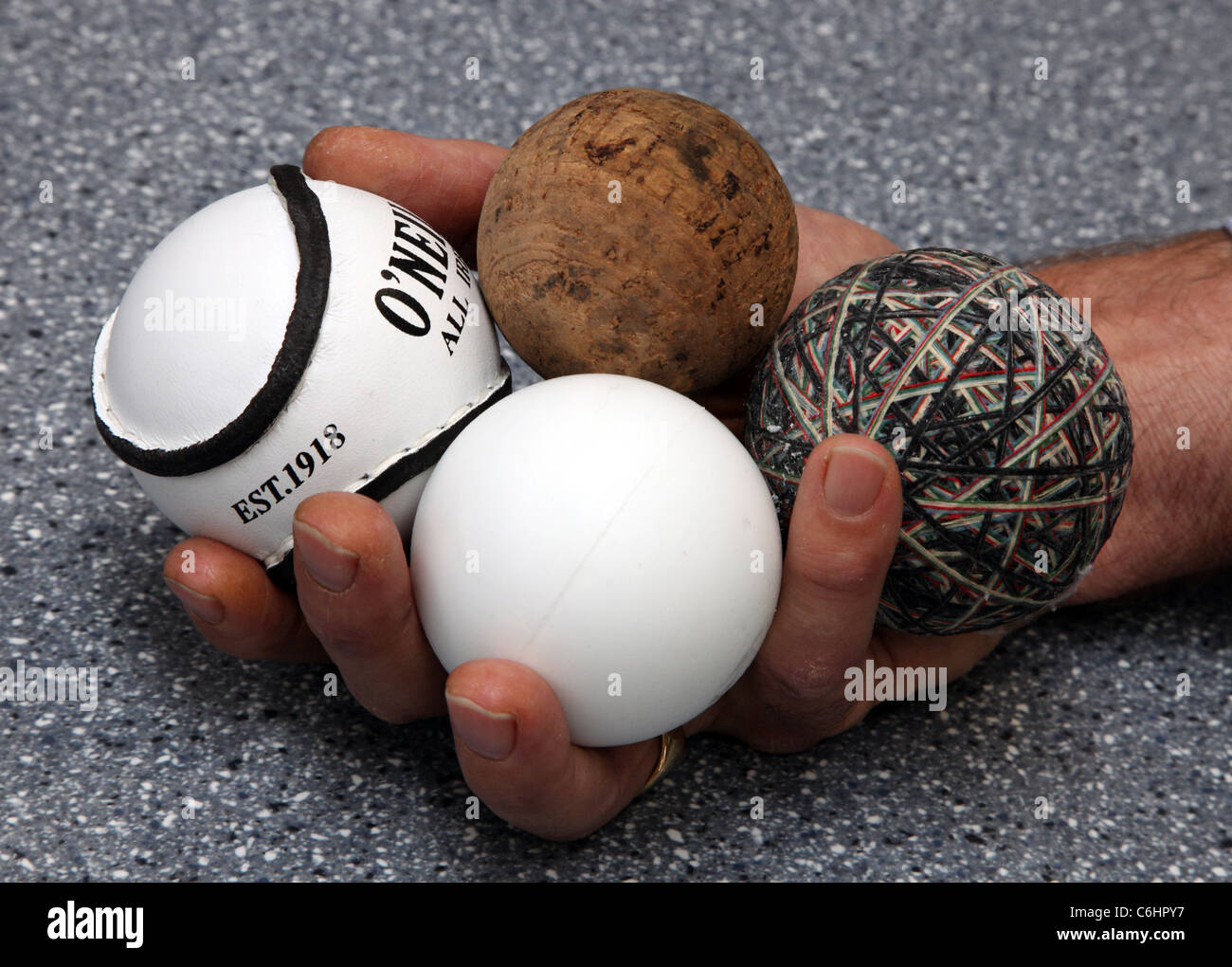Hurling ball and old-style cork core and new chemical core Stock Photo ...