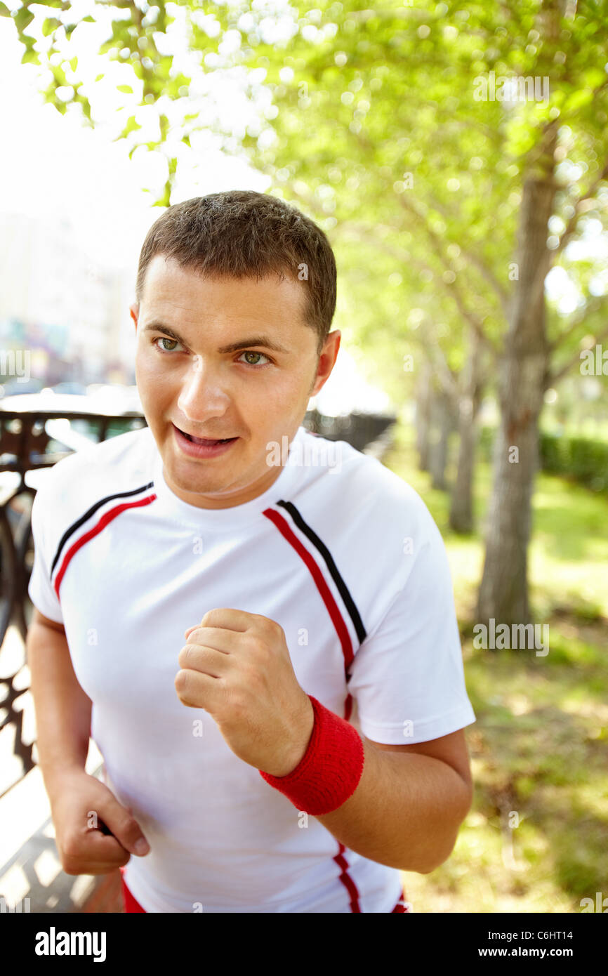 Healthy guy sprinter running outdoor hi-res stock photography and ...