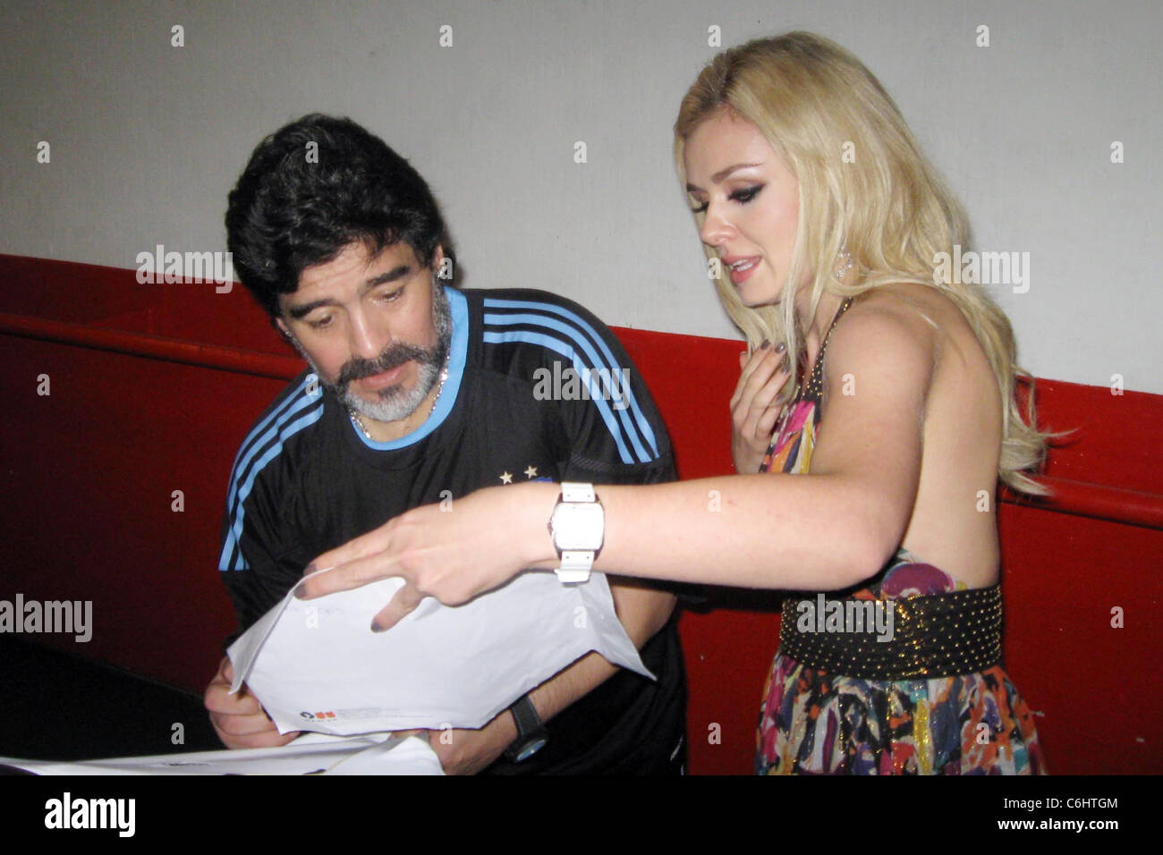 Diego Maradona and Katherine Jenkins sign autographs backstage at the ...