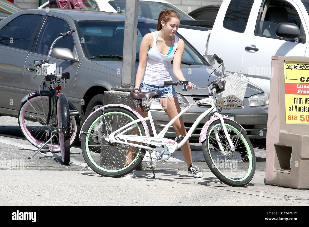 Miley cyrus rides bicycle boyfriend hi-res stock photography and images ...