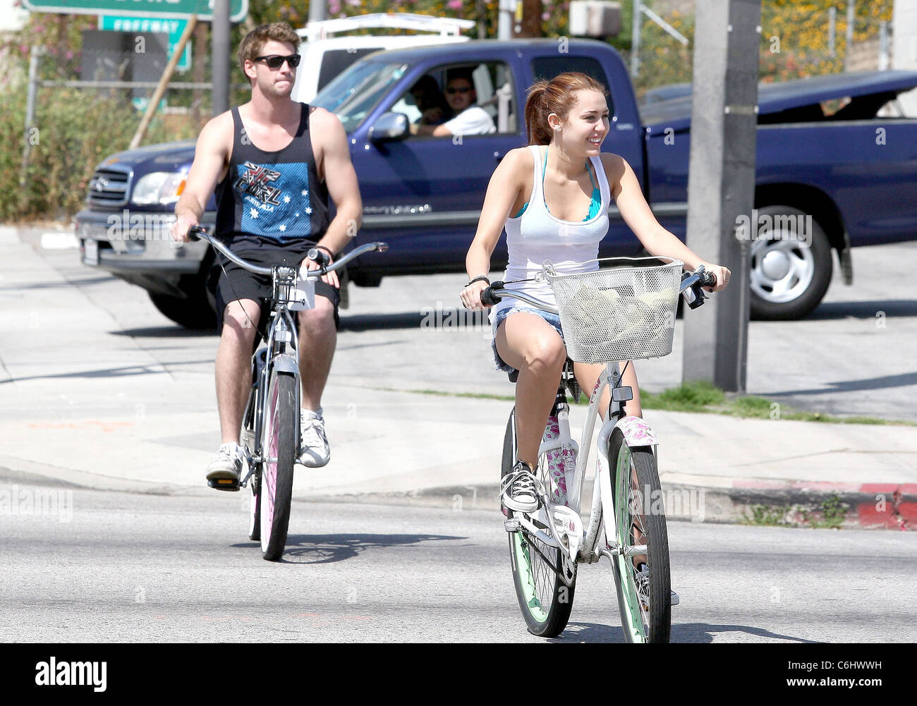 Miley cyrus rides bicycle boyfriend hi-res stock photography and images ...