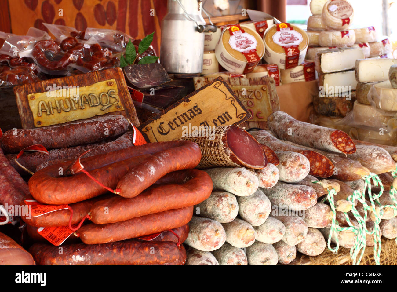 Meat at spanish market with sausage and ham Stock Photo - Alamy