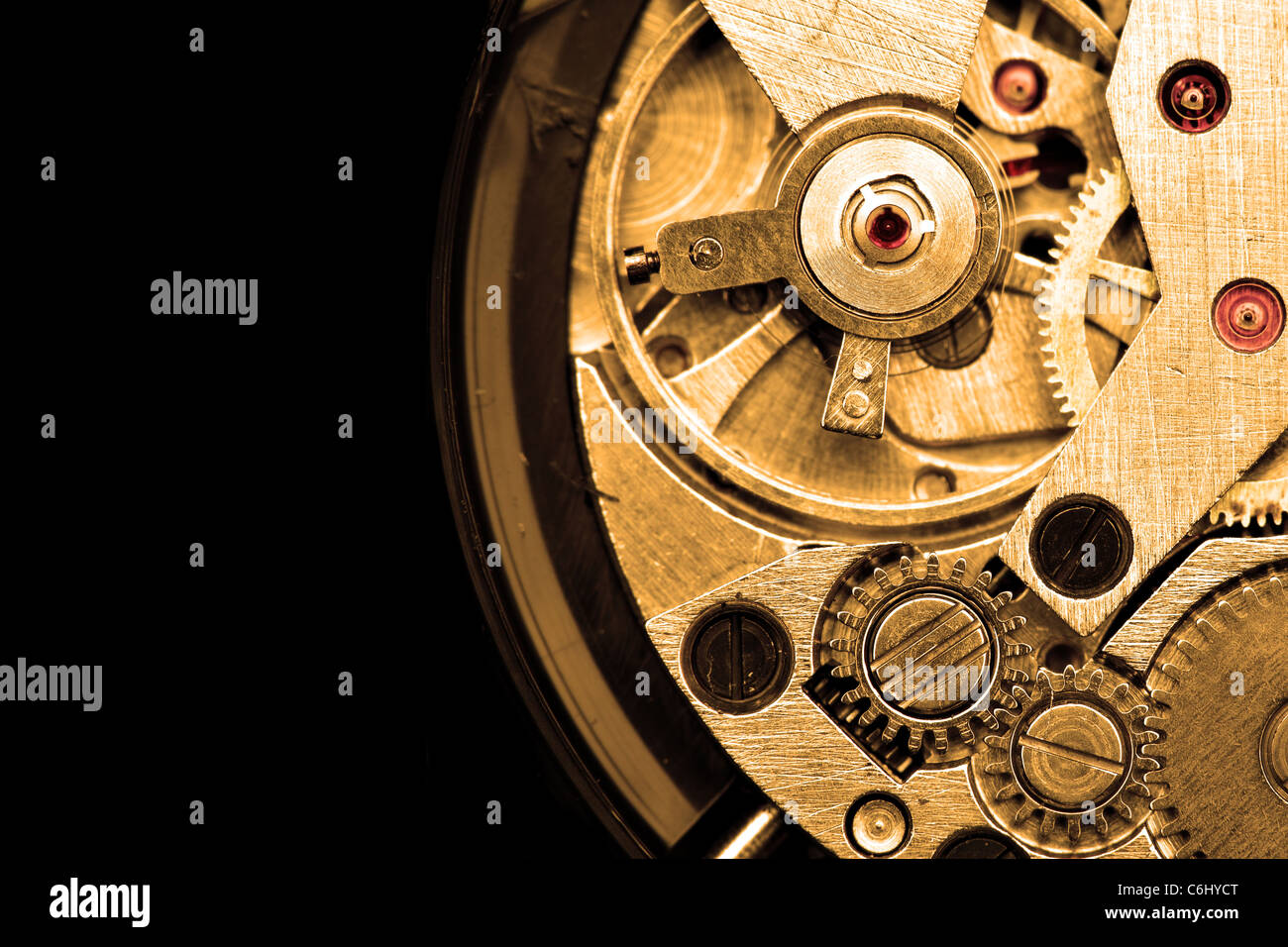 Clockwork macro isolated over the black background Stock Photo - Alamy