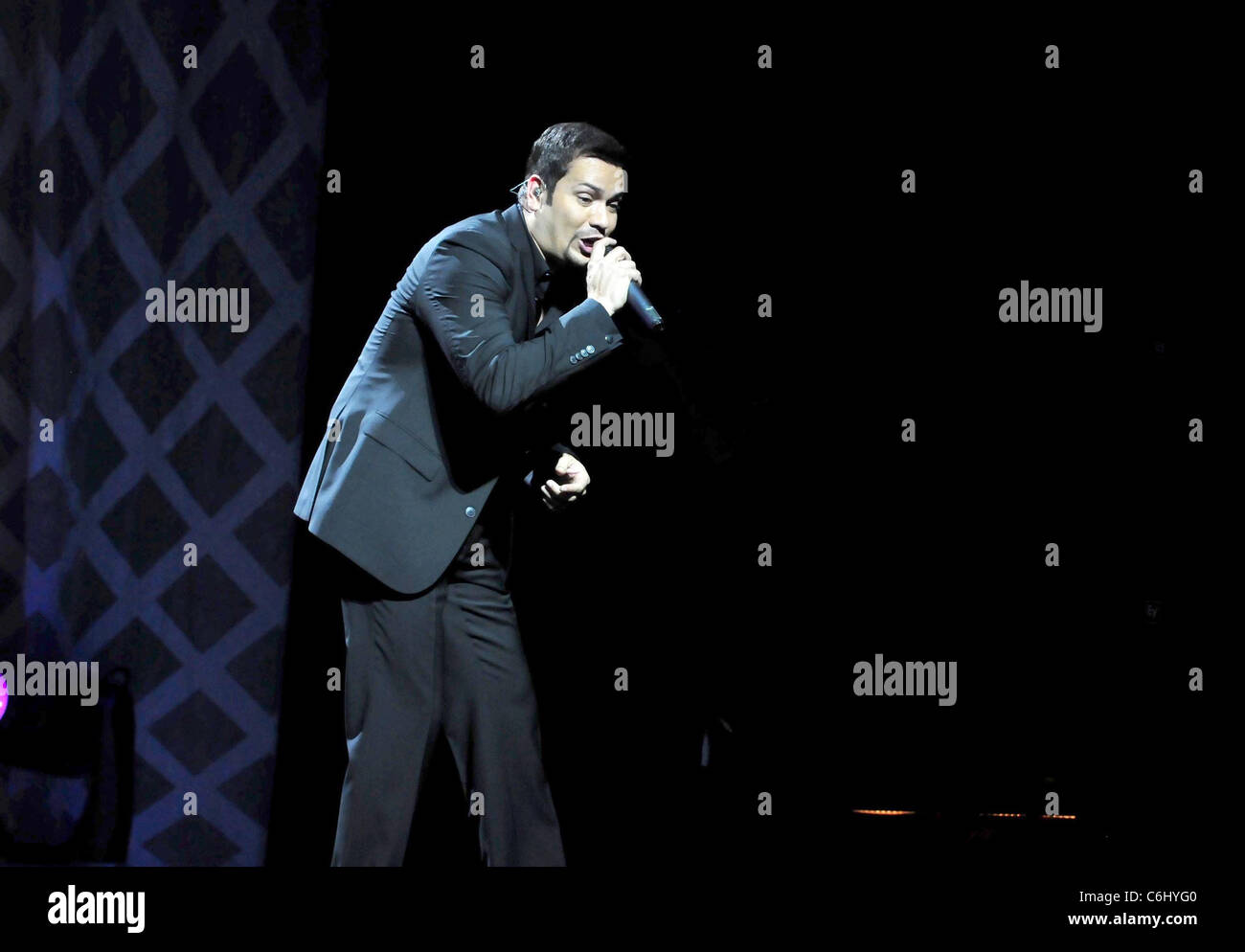 Singer Victor Manuel performs on stage at the James L Knight Center ...