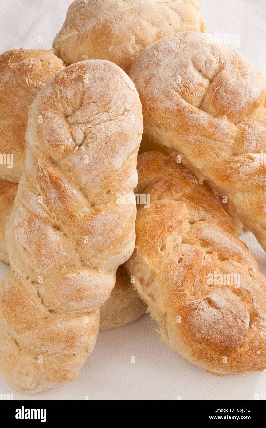 Homemade plaited bread rolls Stock Photo - Alamy
