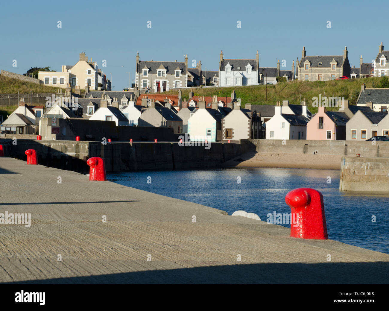 Findochty harbour with gable ends of cottages and red moorings - Moray ...