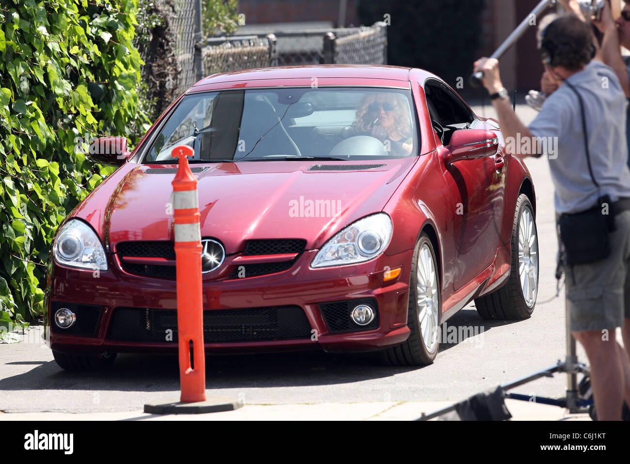 Cameron Diaz driving a Mercedez while filming a on location for her new ...