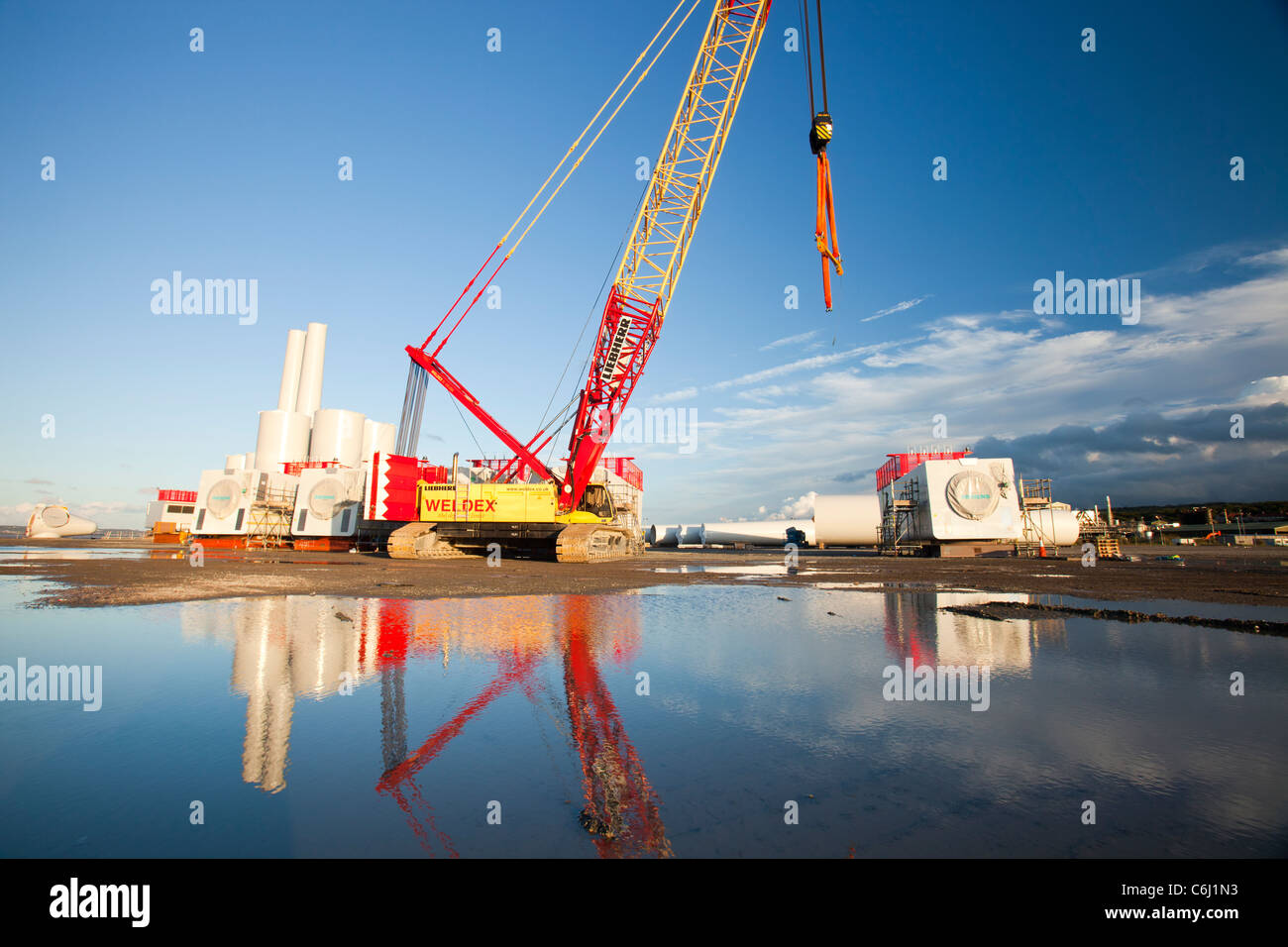 Offshore wind turbine parts on the docks at Mostyn Stock Photo - Alamy