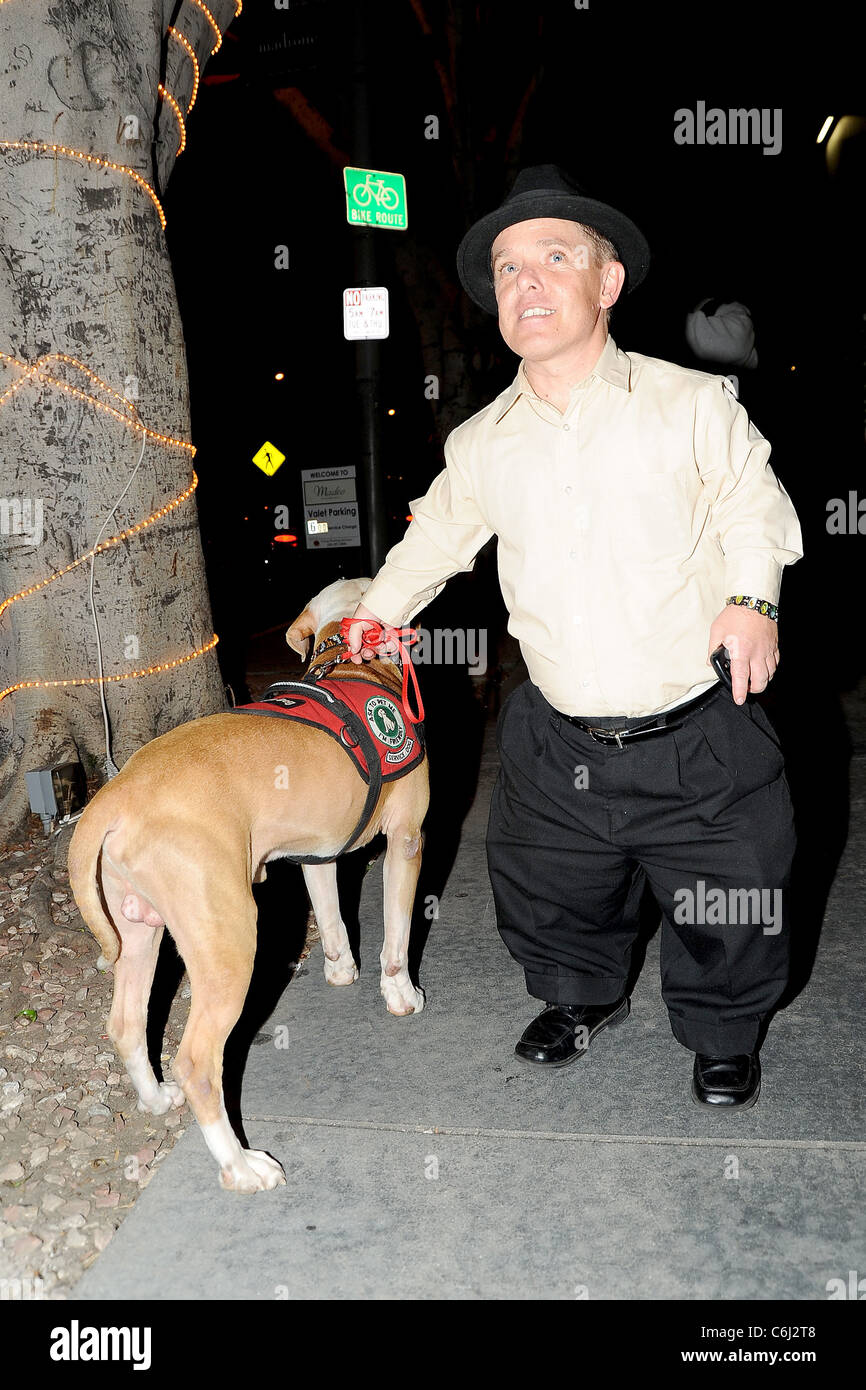 Shorty Rossi star of 'Pit Boss' outside Madeos restaurant with his dog ...