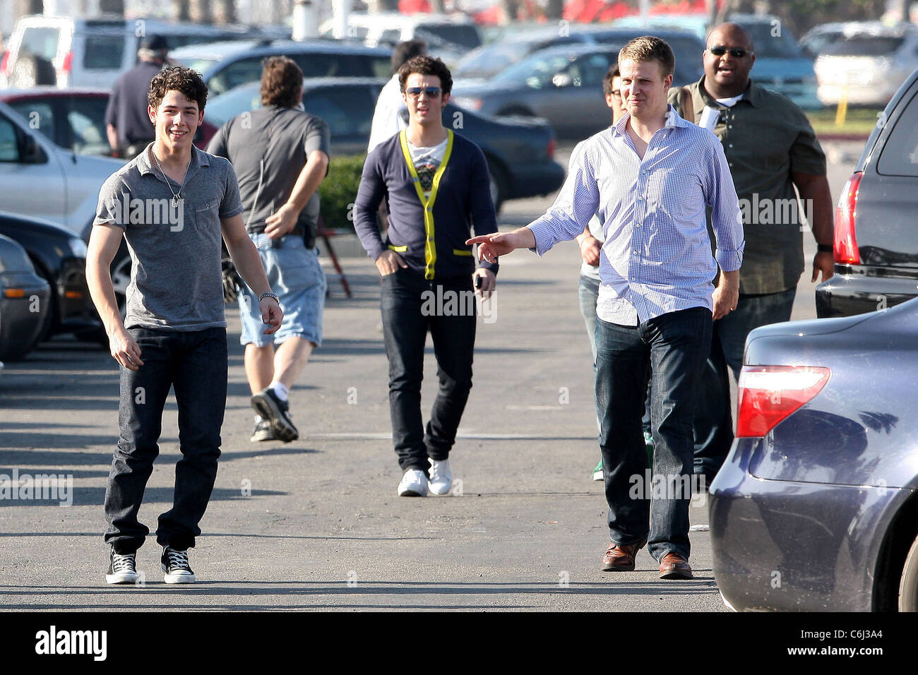 Nick Jonas and Kevin Jonas Jonas Brothers playing American football ...