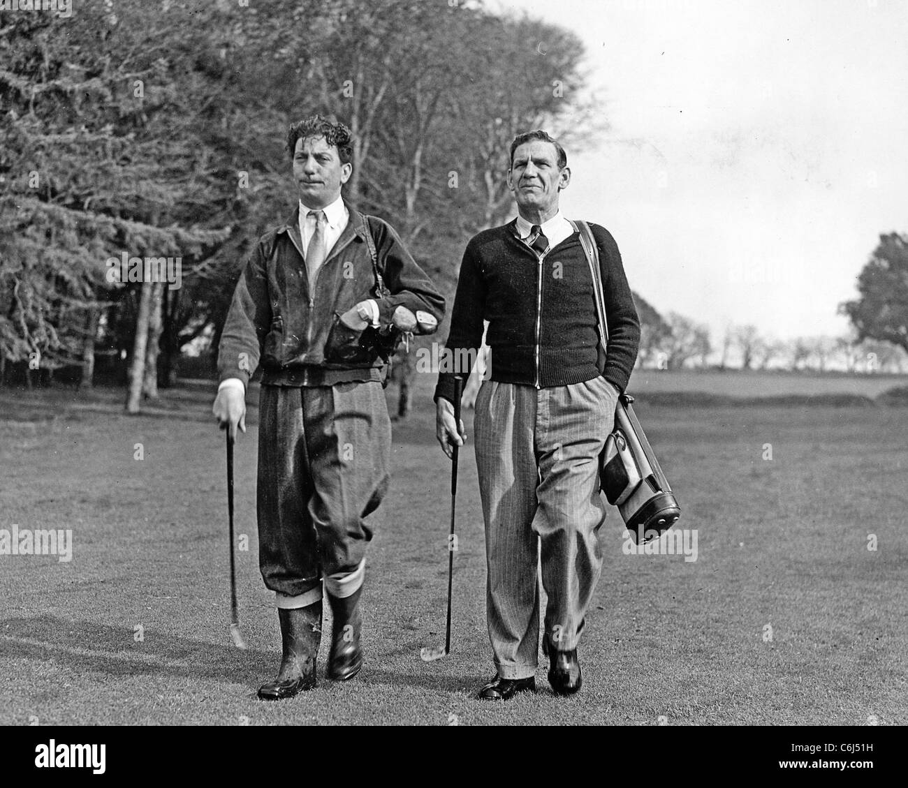 SID FIELD UK comedian at left with fellow comic Will Hay about 1940 Stock Photo - Alamy