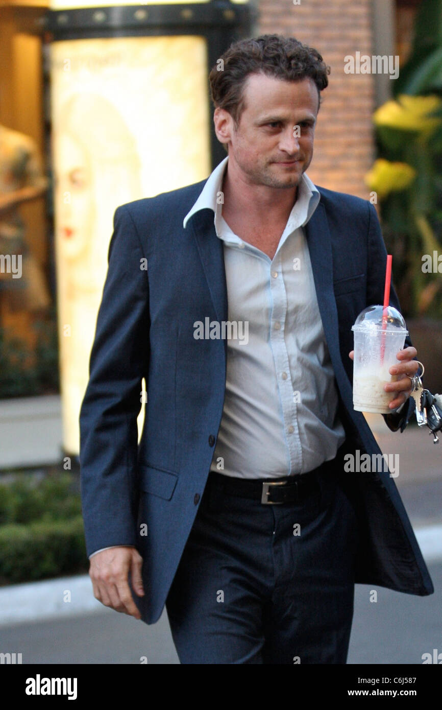 David Moscow enjoying a cold beverage while out shopping in Hollywood ...