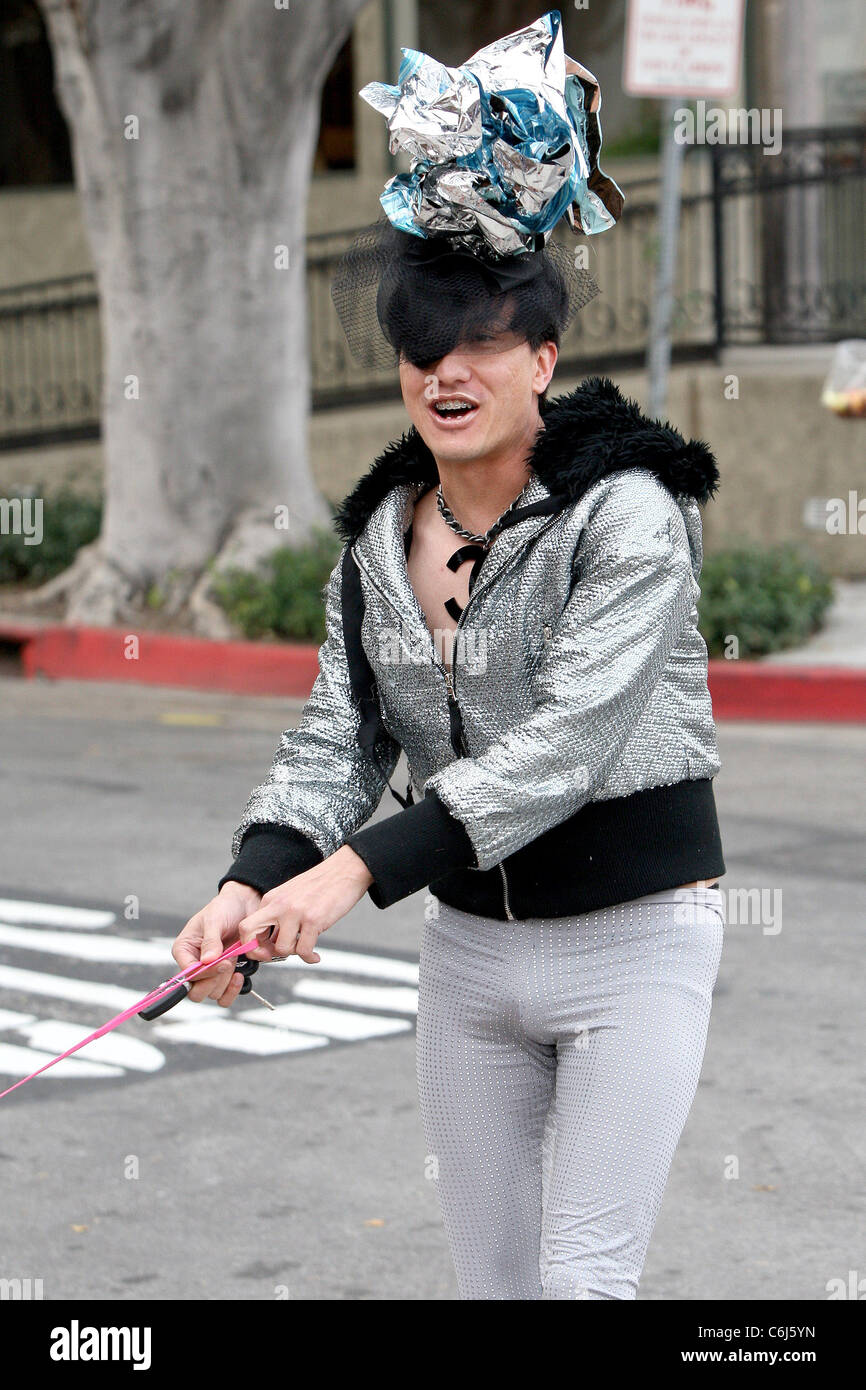 Bobby Trendy walking down Robertson Boulevard with his dog while ...