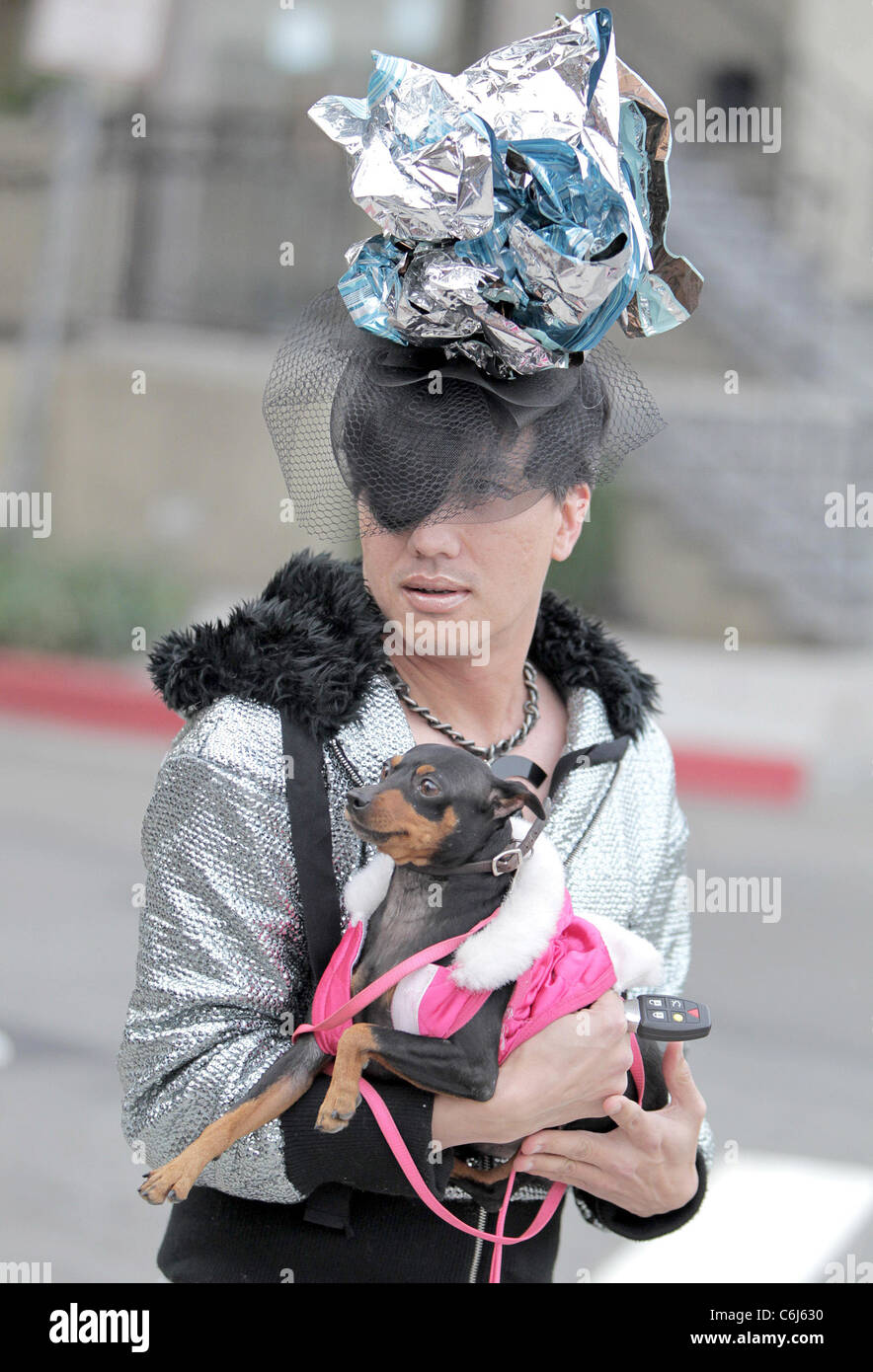 Bobby Trendy walking down Robertson Boulevard with his dog while ...