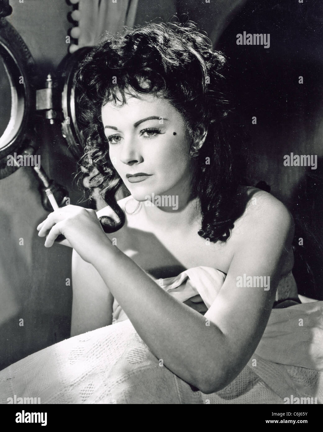 MARGARET LOCKWOOD (1916-1990) English film actress at her Roehampton home in 1942 Stock Photo ...