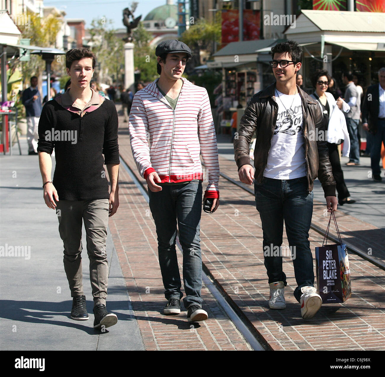 Joe Jonas and friends shopping at The Grove in Hollywood Los Angeles ...