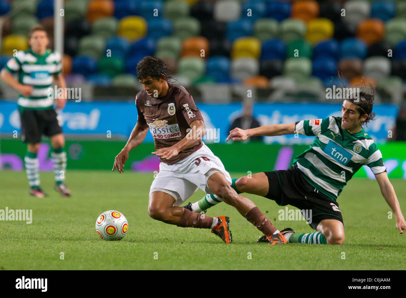 Pedro Mendes from Sporting vies the ball with Wires from Rio Ave during the football match ...
