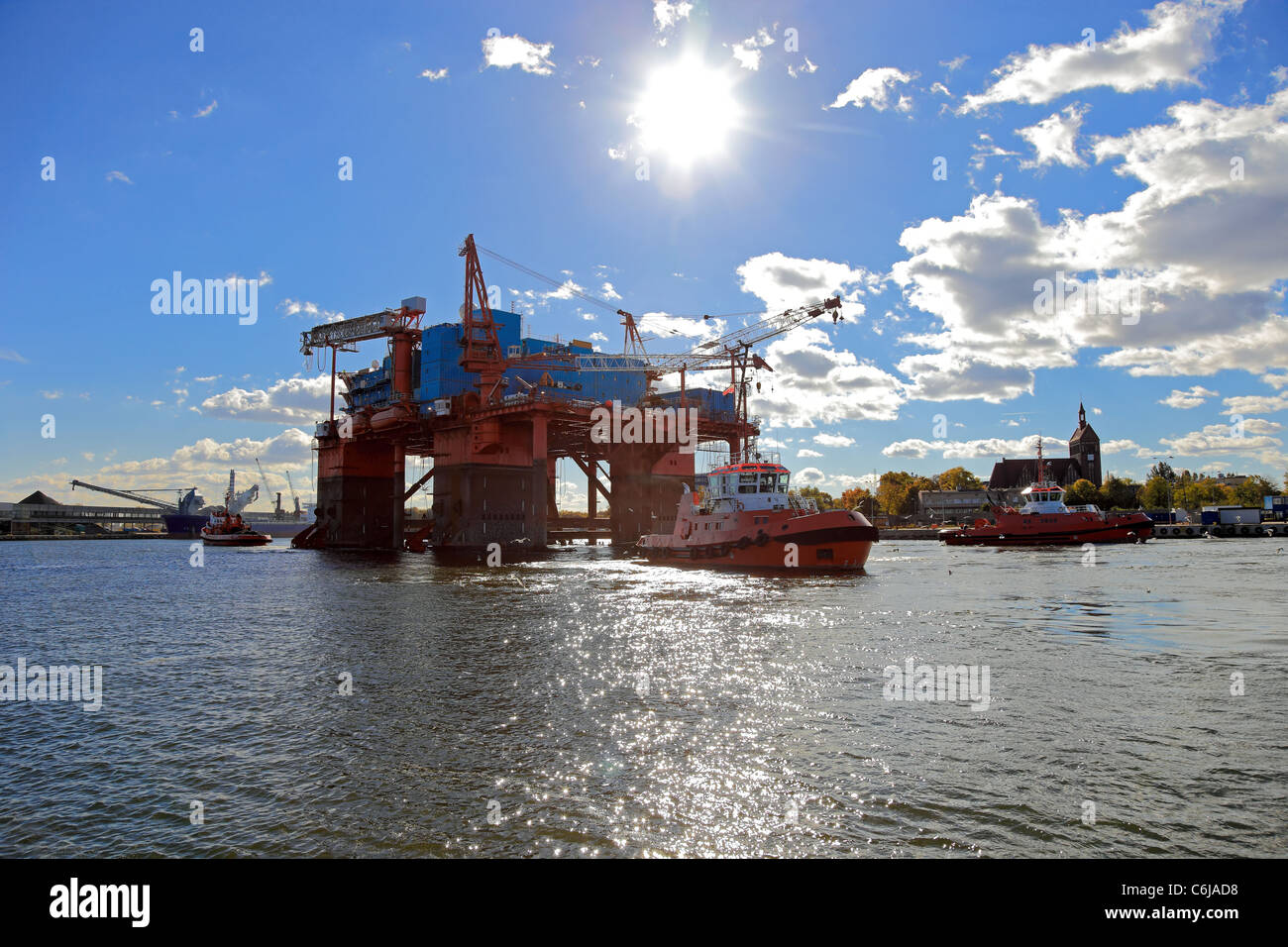 The introduction of a drilling rig to a shipyard for repairs. Photo ...