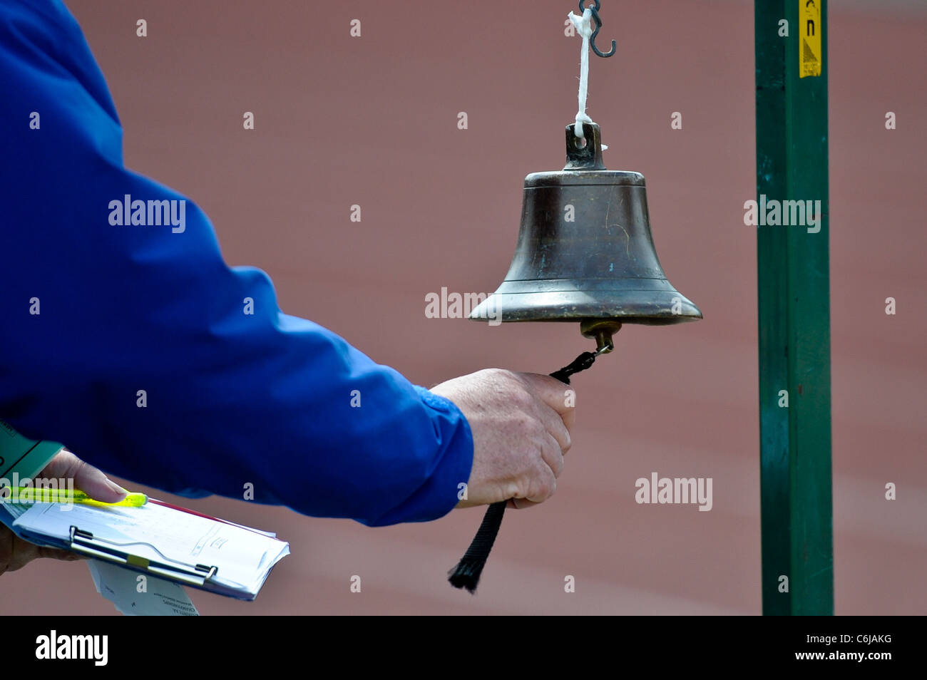 Athletics last lap bell hi-res stock photography and images - Alamy