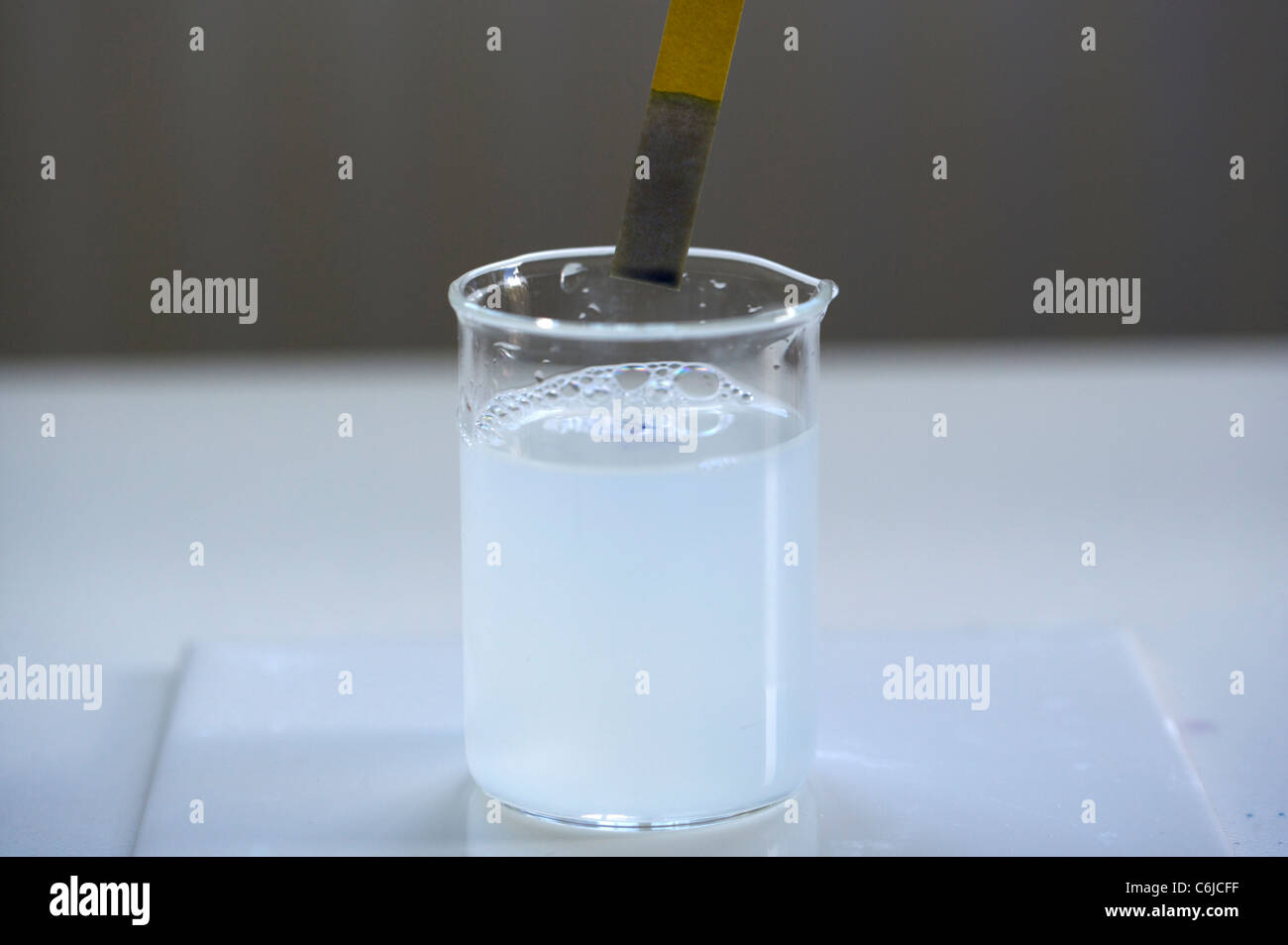 pH test using indicator paper - alkali pH 8 Stock Photo - Alamy