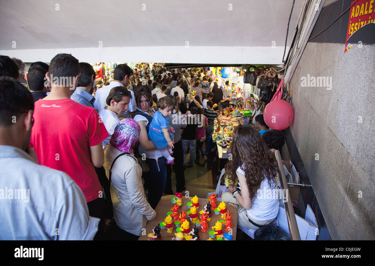 Turkey, Istanbul, Eminonu, busy subway with stall selling childrens ...