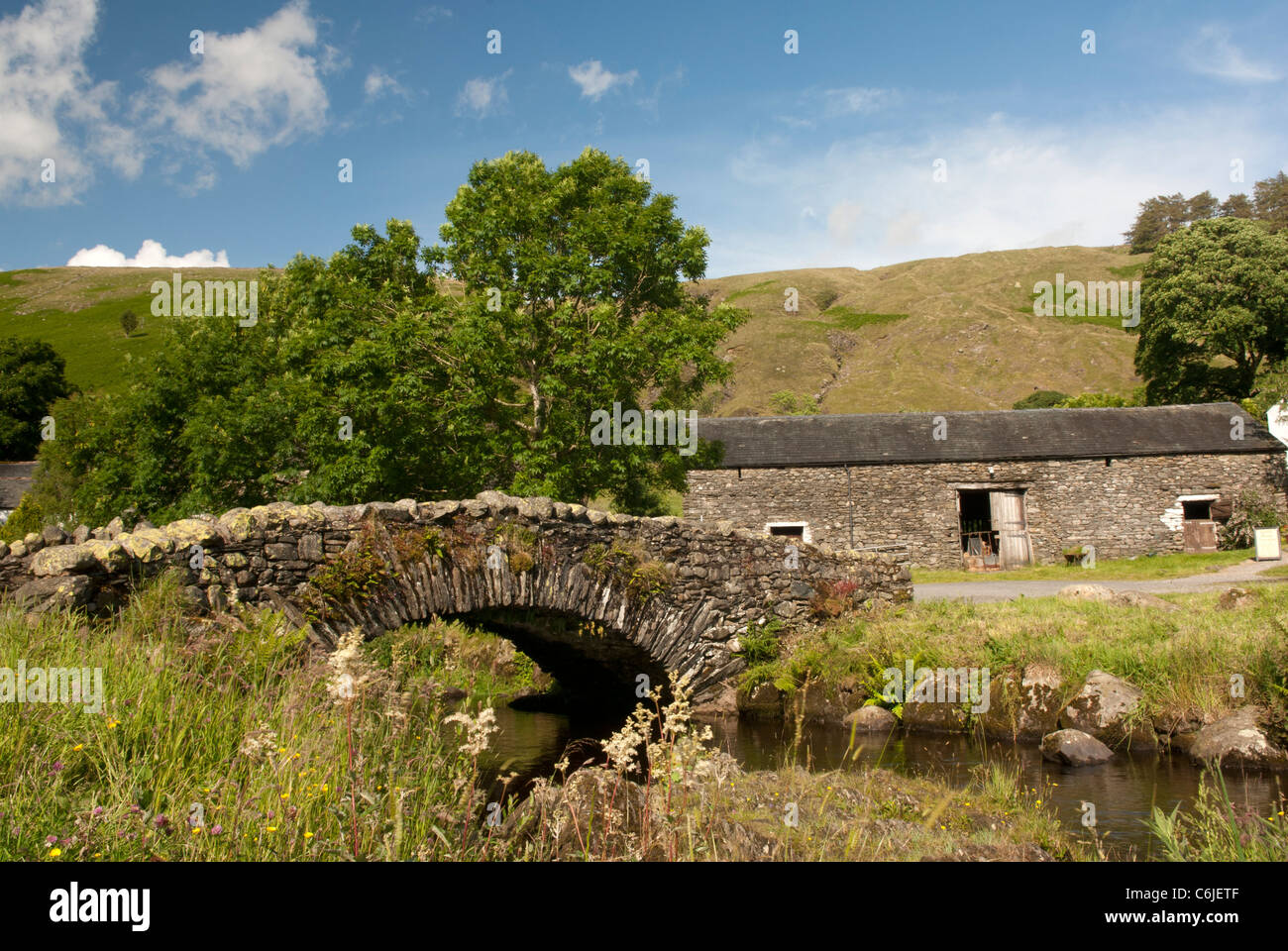 Packhorse bridge at Watendlath, Lake District National Park, Cumbria ...
