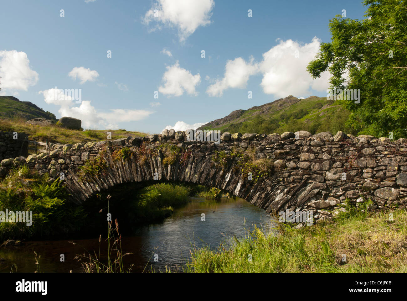 Packhorse bridge at Watendlath, Lake District National Park, Cumbria ...