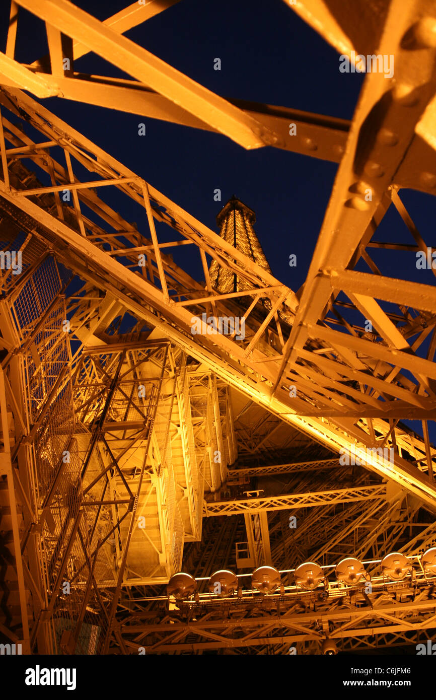 the eiffel tower in paris france at night metal steel structure ...