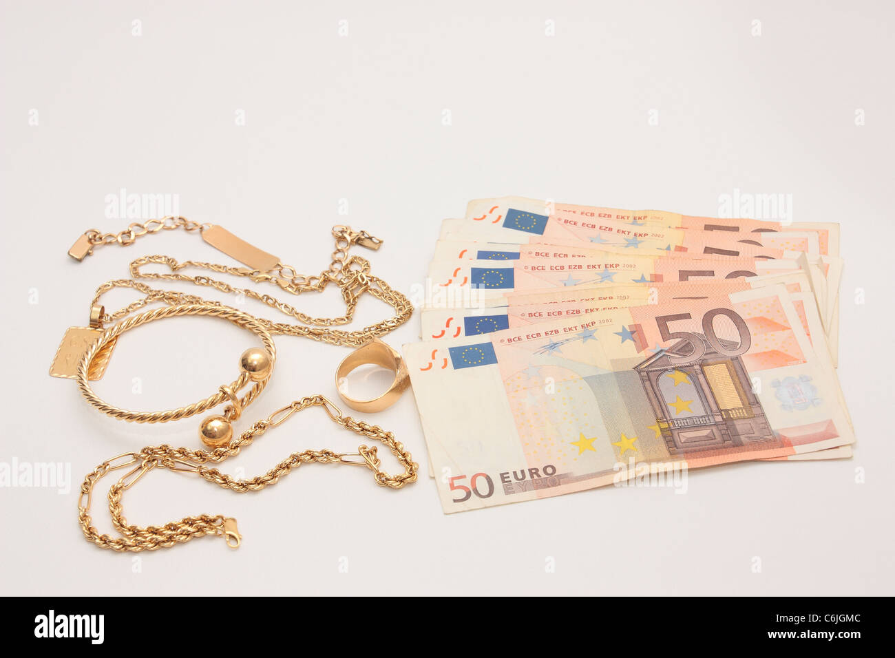 Buying and selling gold Stock Photo - Alamy