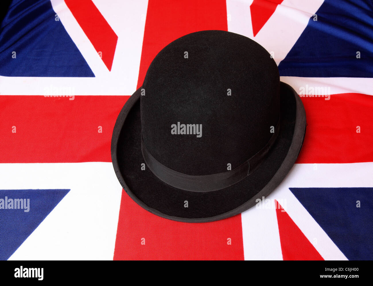 BRITISH BOWLER HAT ON UNION JACK Stock Photo - Alamy