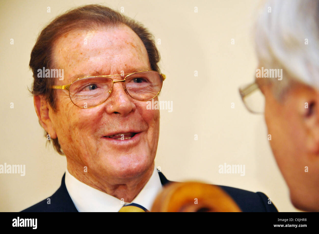 British actor Sir Roger Moore, who is well known for the portrayal of ...