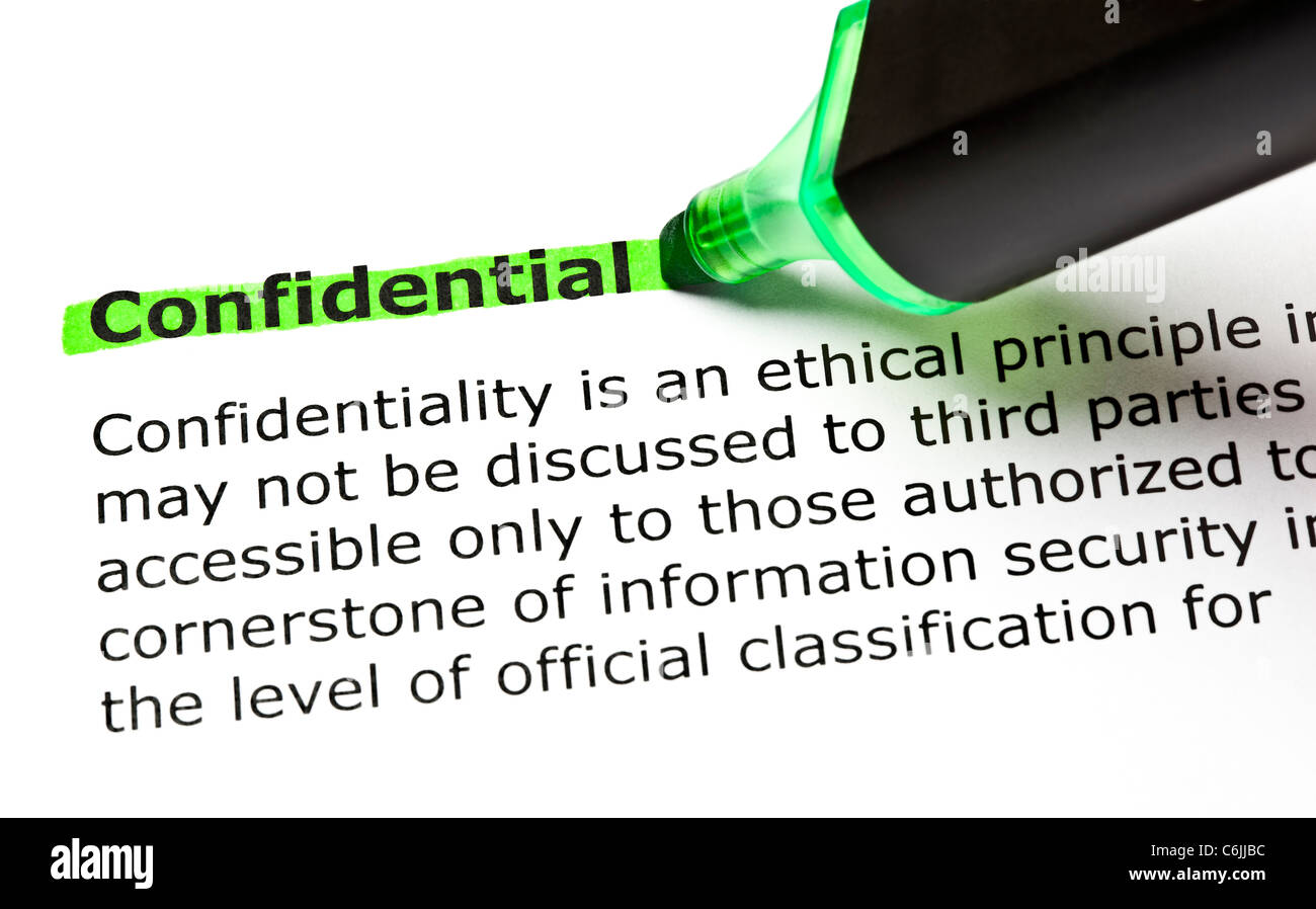 The word CONFIDENTIAL highlighted in green with felt tip pen Stock ...