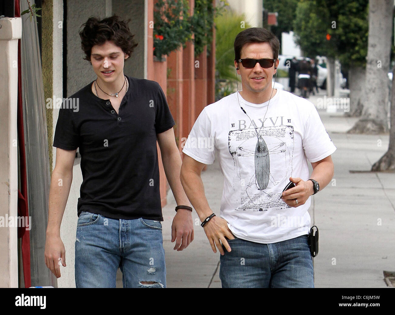 Actor/Producer Mark Wahlberg hanging out with his friend Beverly Hills ...