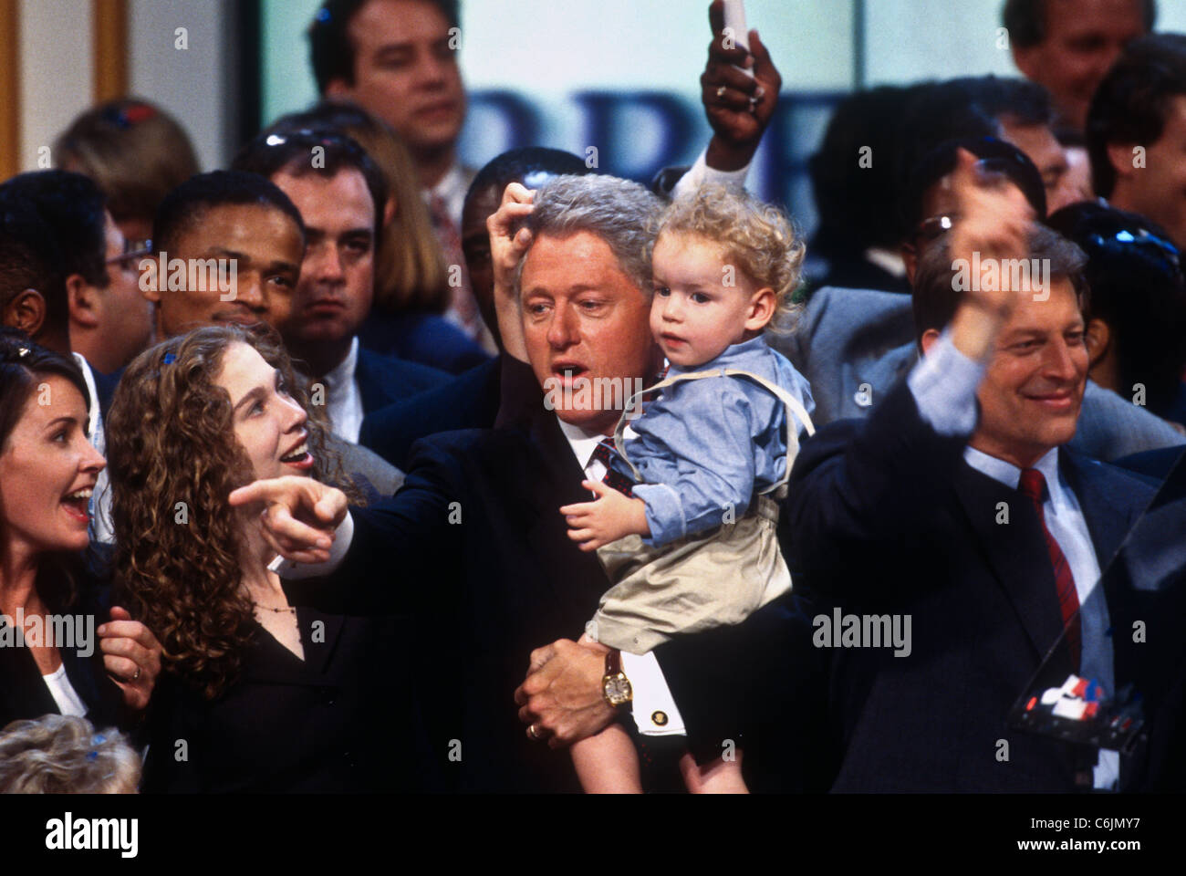 President Bill Clinton holds nephew Tyler with daughter Chelsea at the ...