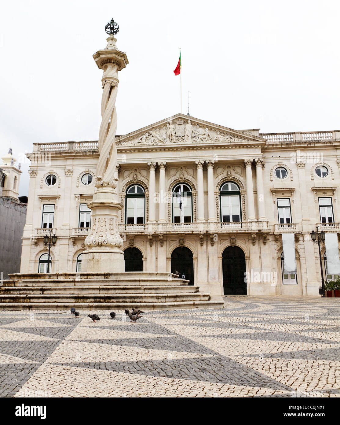 historic town hall of Lisboa capitol of Portugal with portuguese flag ...