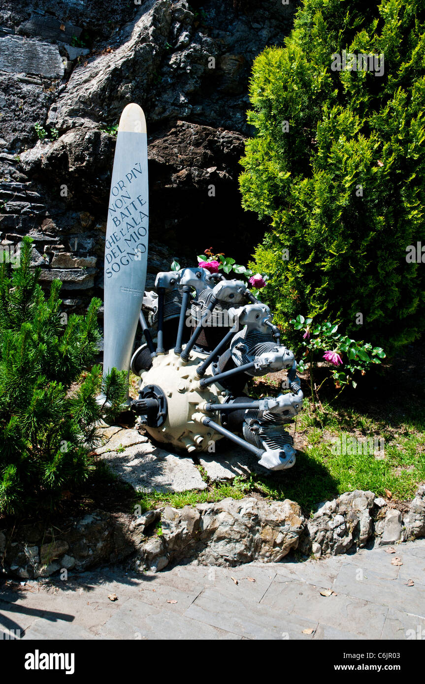 A secluded quiet area containing a memorial painted aircraft engine and ...