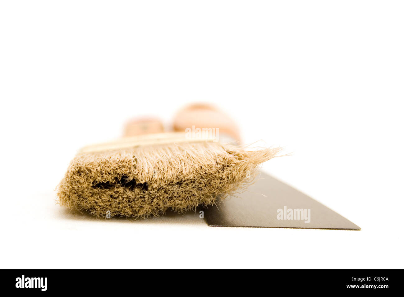 paintbrush and putty knife, isolated on white Stock Photo - Alamy